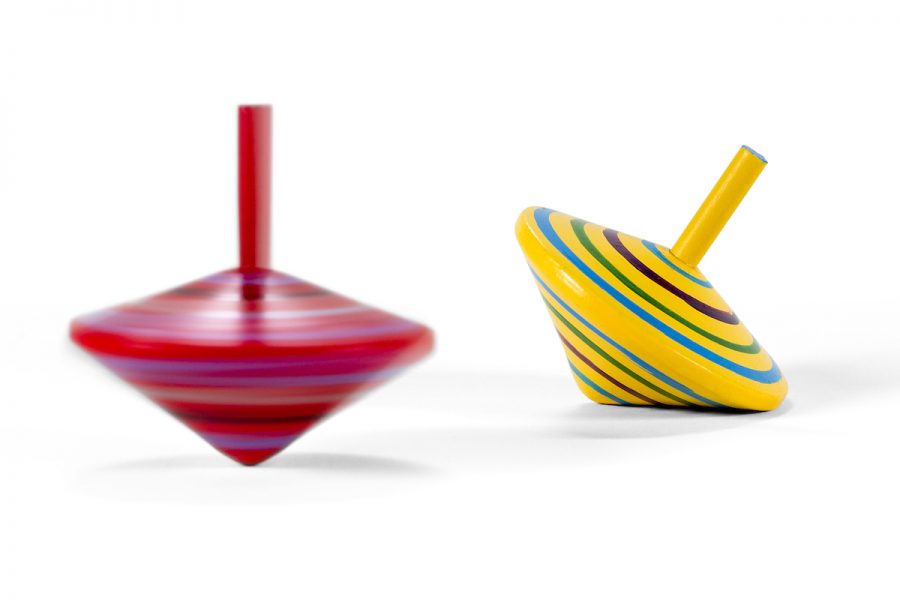 Two wooden and colorful spinning tops - PhysioMobile